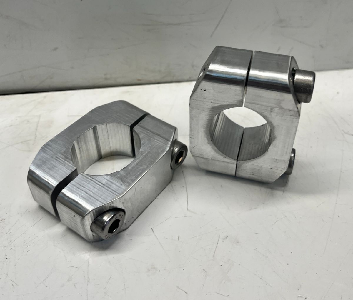 Secondary shock slider clamps